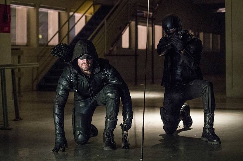 Arrow & Prometheus Have an Explosive Confrontation in New Photos