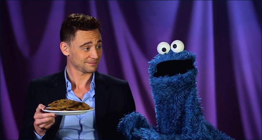 Loki teaches Cookie Monster about delayed gratification