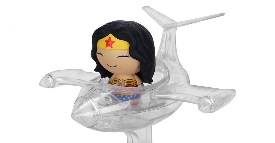 Adorable Wonder Woman with invisible jet is flying to your shelf