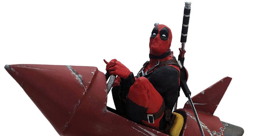 Deadpool blasts off with this rocket ride motion statue
